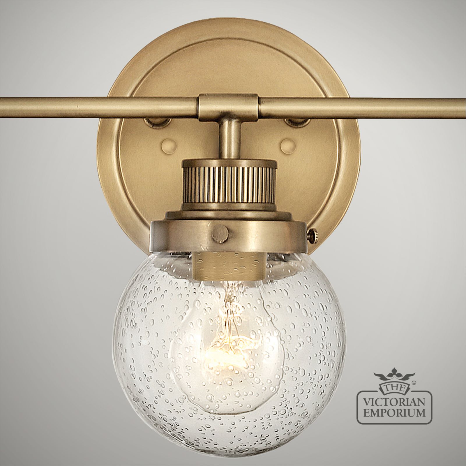 Poppy Triple Bathroom Wall Light in Heritage Brass