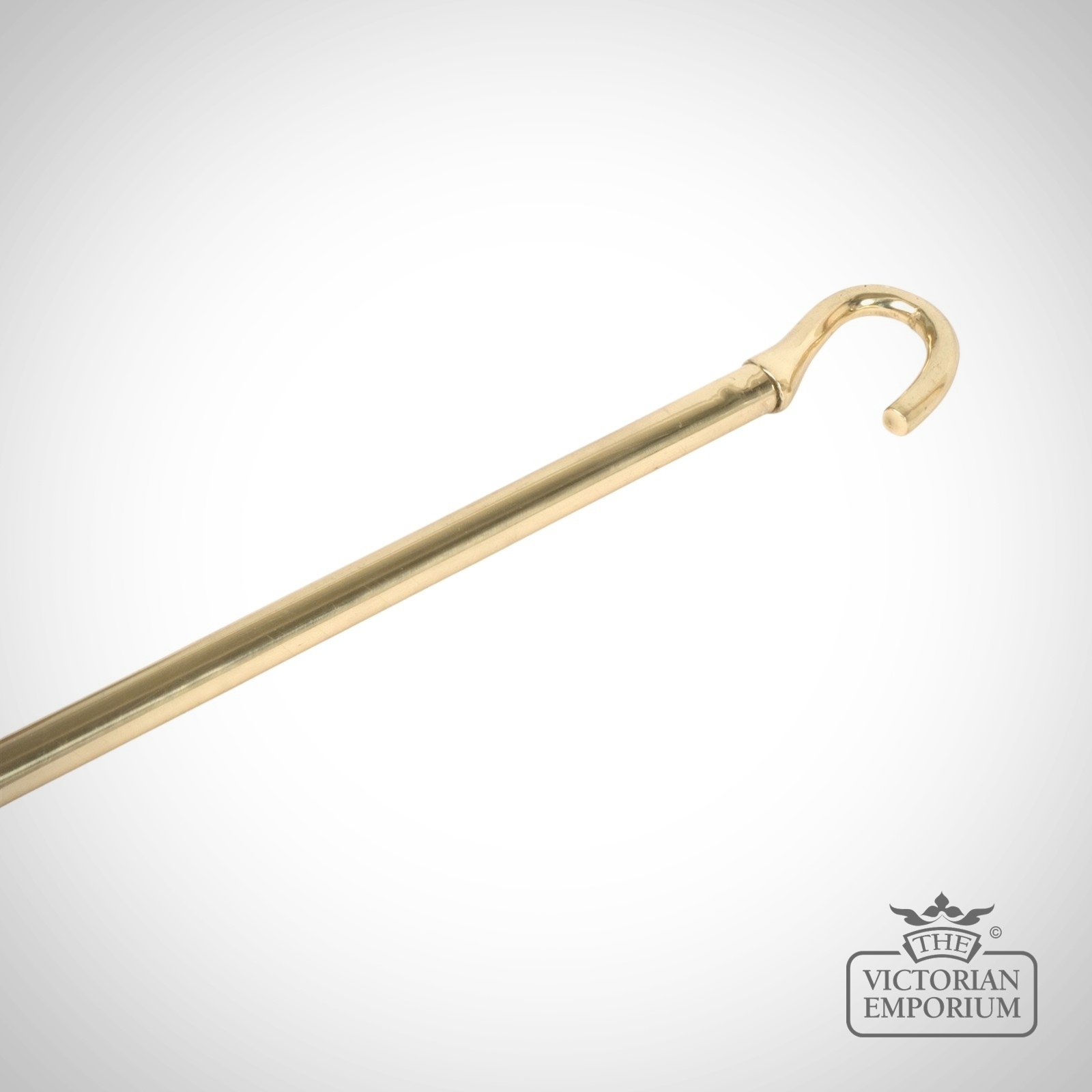 Polished brass window winder with handle