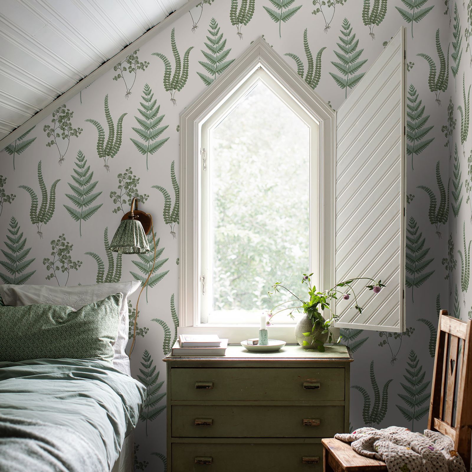 Fern wallpaper featuring a variety of green plants in subtle colours